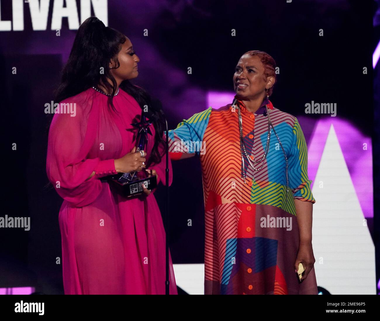 Jazmine Sullivan accepts the album of the year award for "Heaux Tales ...