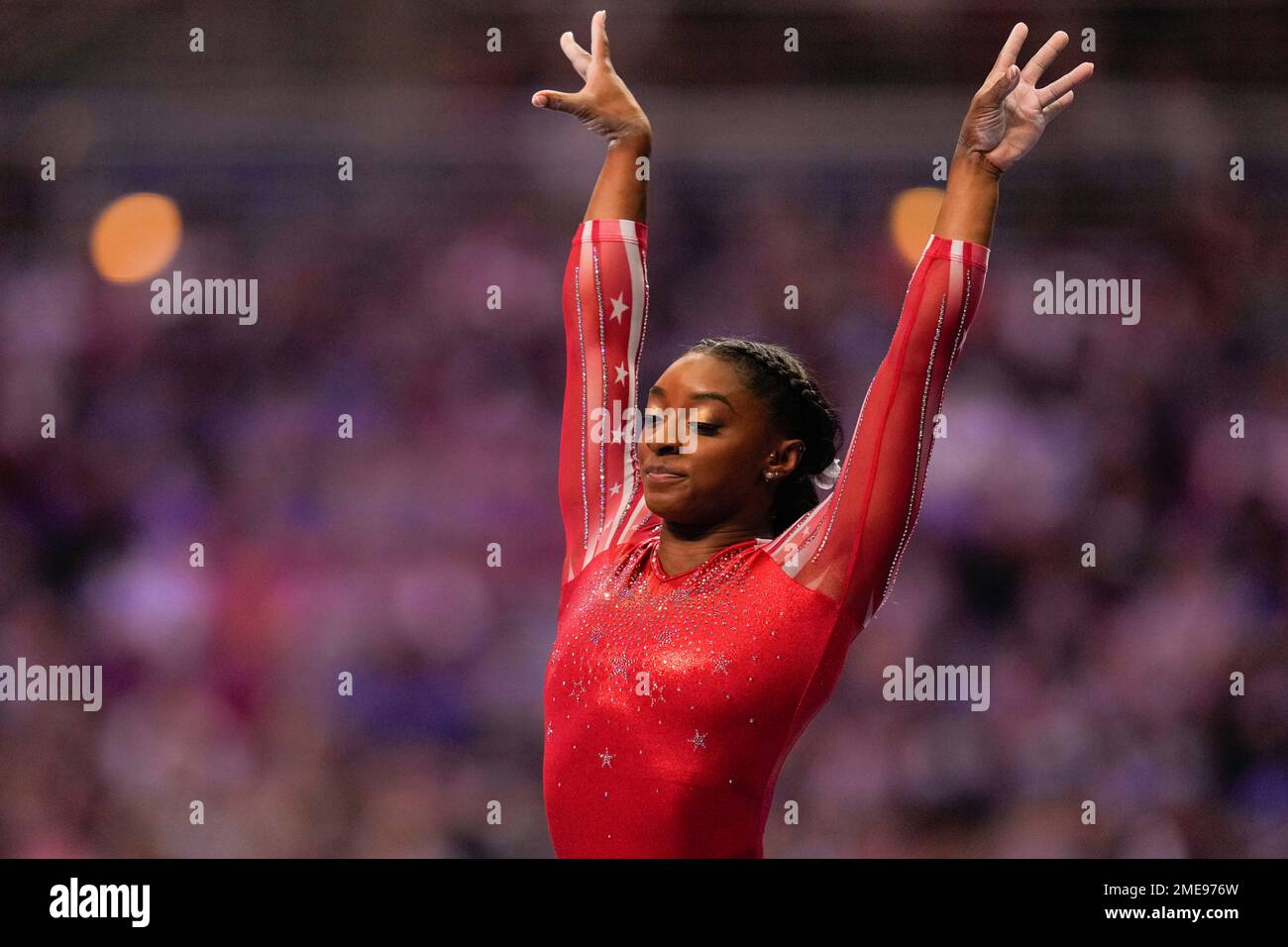 Simone Biles lands after competing on the vault during the women's U.S ...