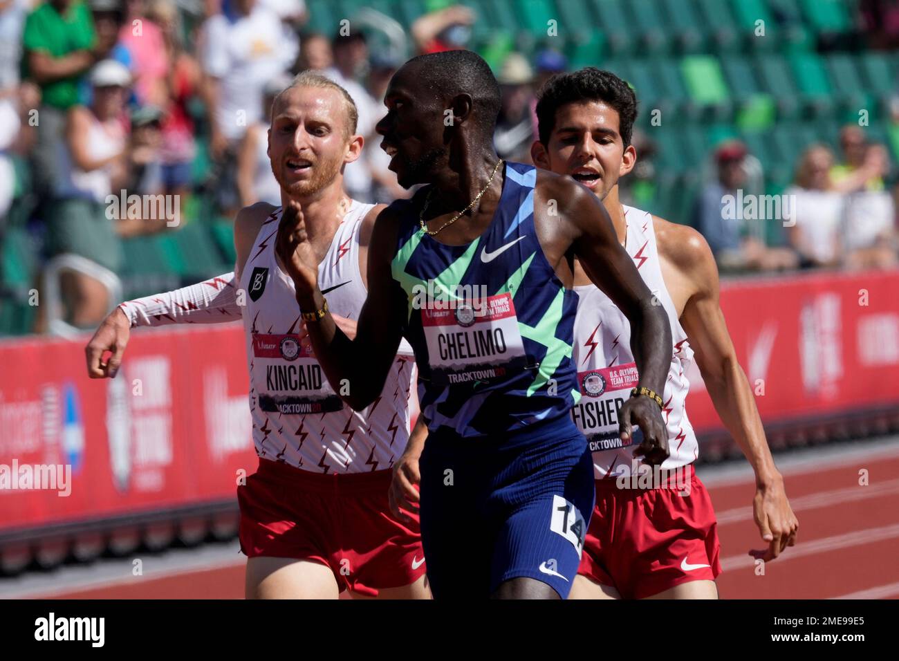 Paul Chelimo celebrates after beating Grant Fisher and Woody Kincaid in ...
