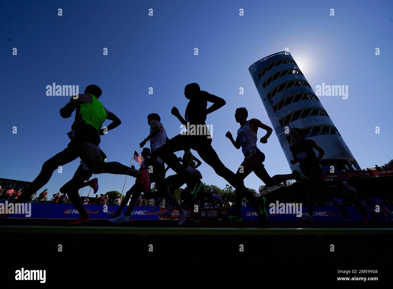 Runners compete during the finals of men's 5000-meter run at the U.S ...