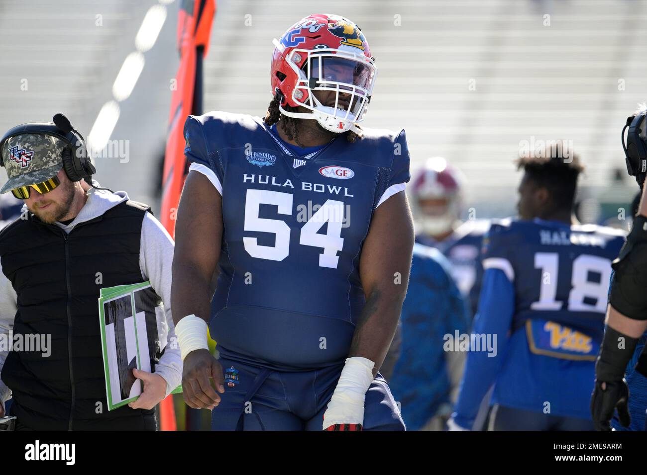 Team Aina offensive lineman Johari Branch (54) stands on the sideline ...