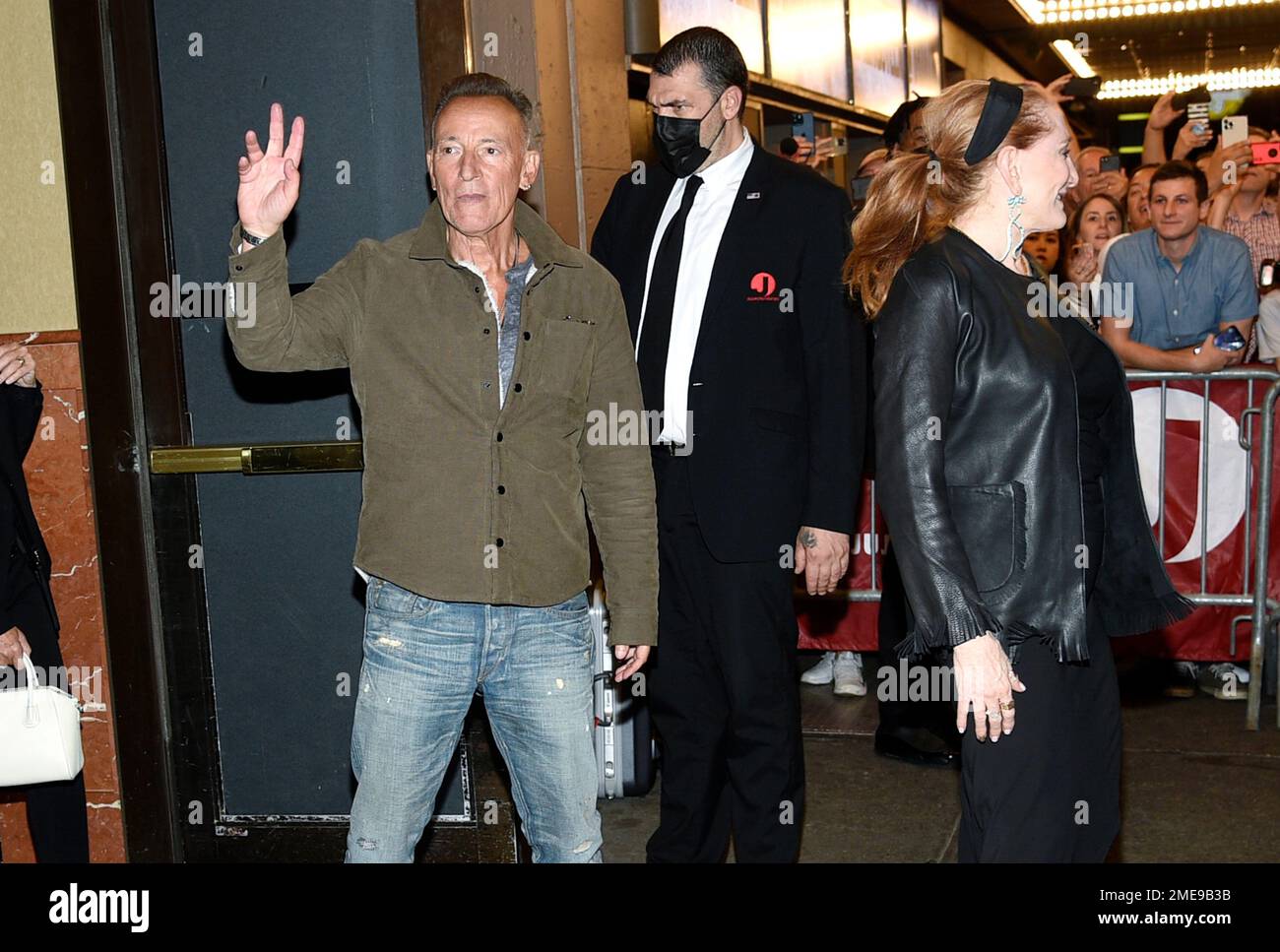Singer-songwriter Bruce Springsteen, left, and wife Patti Scialfa ...