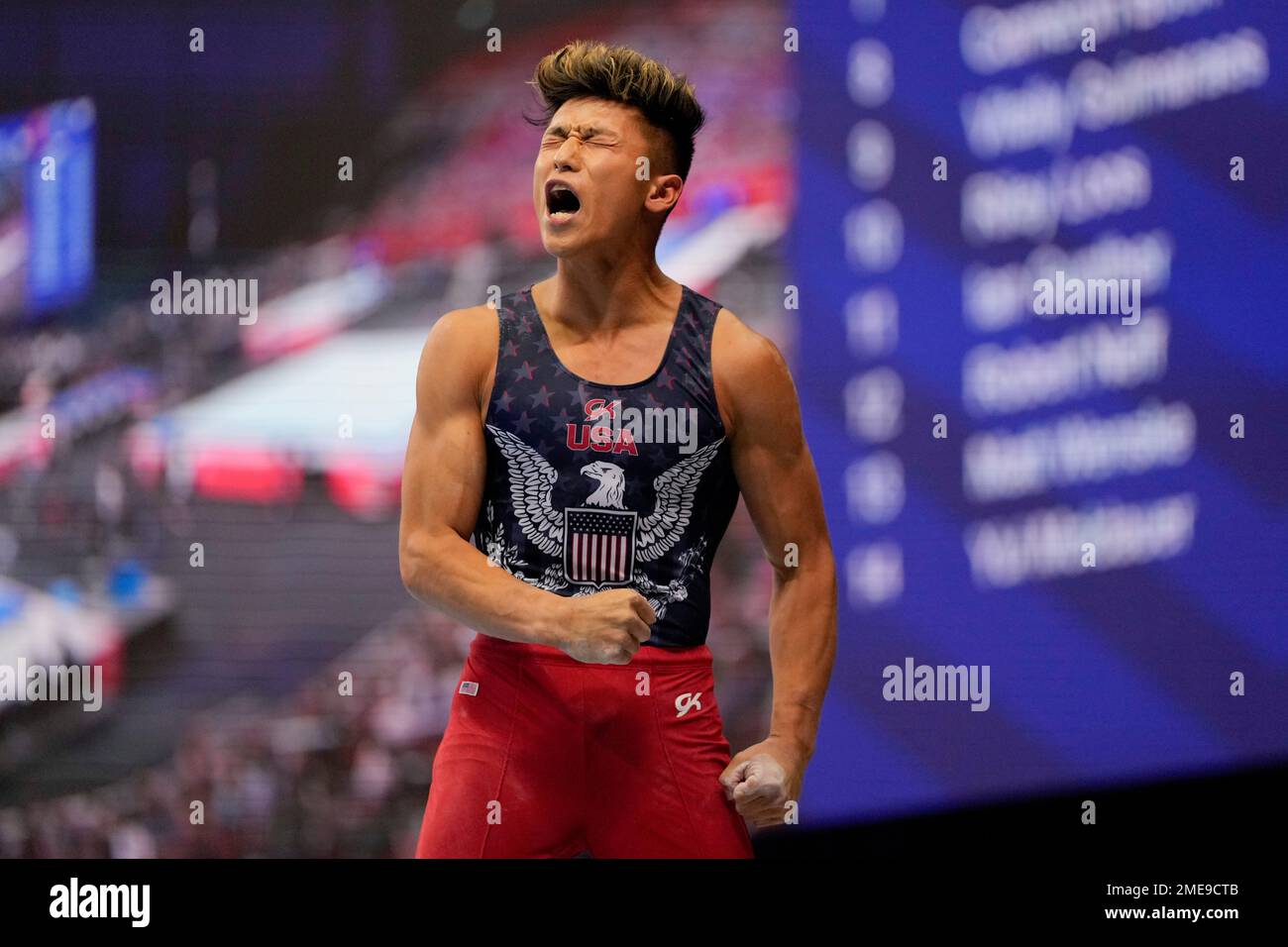 Yul Moldauer celebrates after competing on the parallel bars during the ...