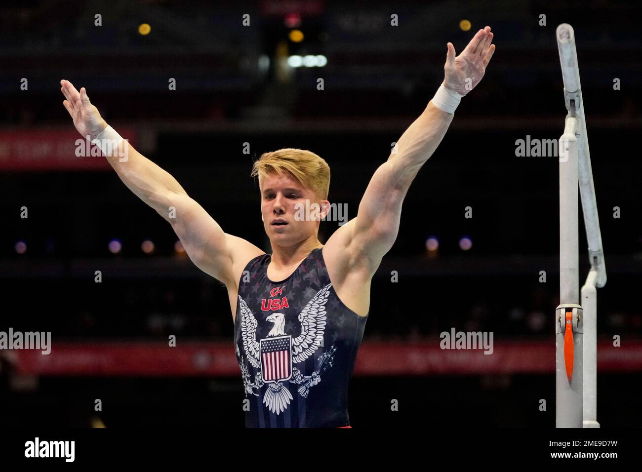 Shane Wiskus celebrates after competing on the parallel bars during the ...