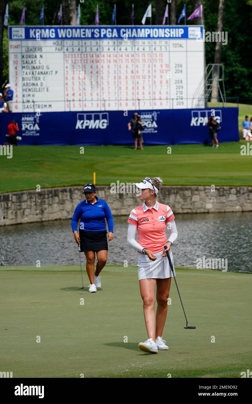 Nelly Korda of the U.S., right, and Lizette Salas, also of the U.S., walk off the course after ...