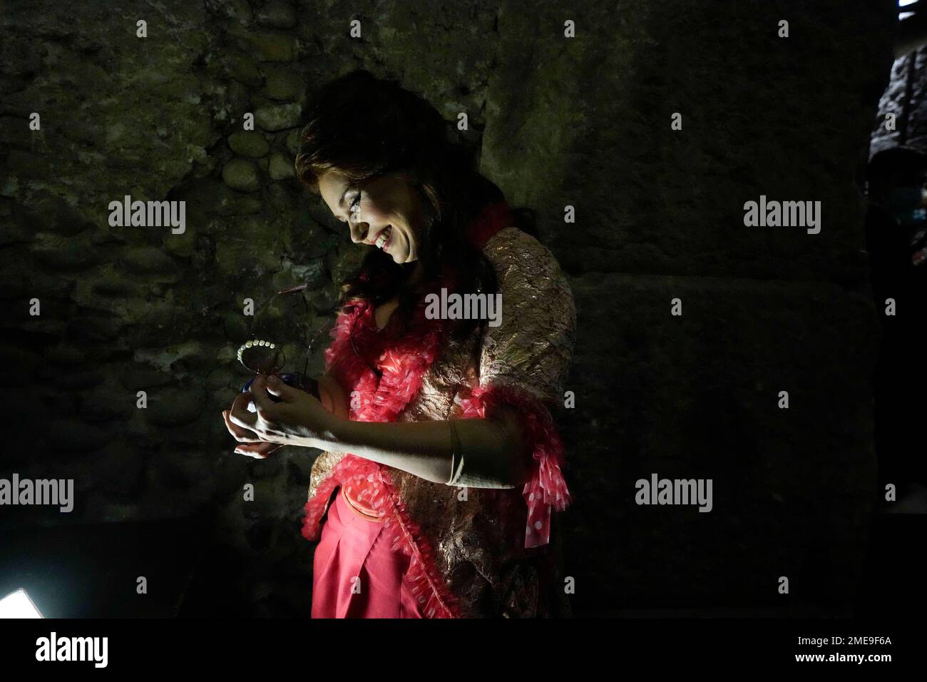 Singer and actress Marina Rebeka cleans her glasses prior to perform in ...