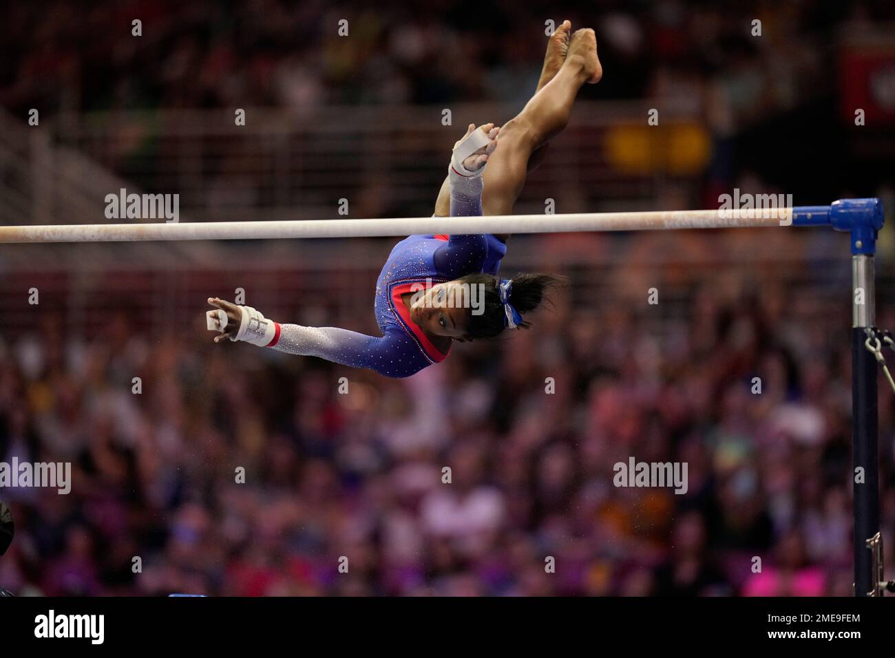 Simone Biles competes on the uneven bars during the women's U.S ...