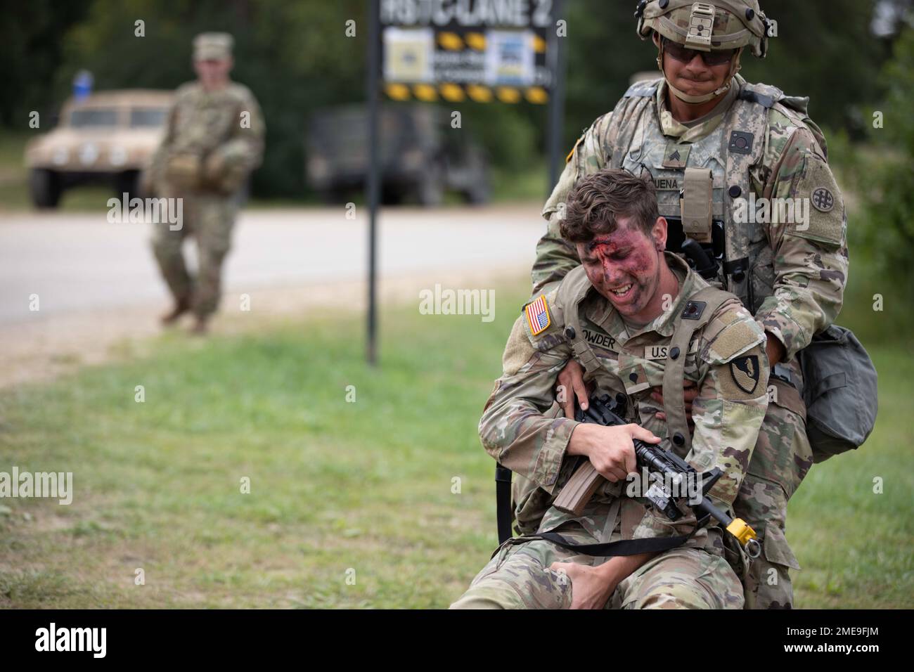 U.S. Army Spc. Andrew Lowder with the 41st Route Clearance Company acts ...