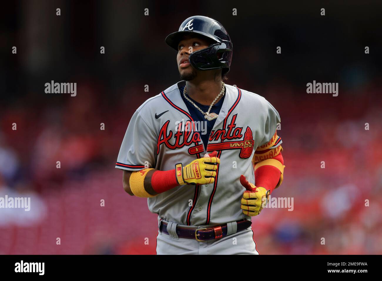 Atlanta Braves' Ronald Acuna Jr. walks to the dugout after batting ...