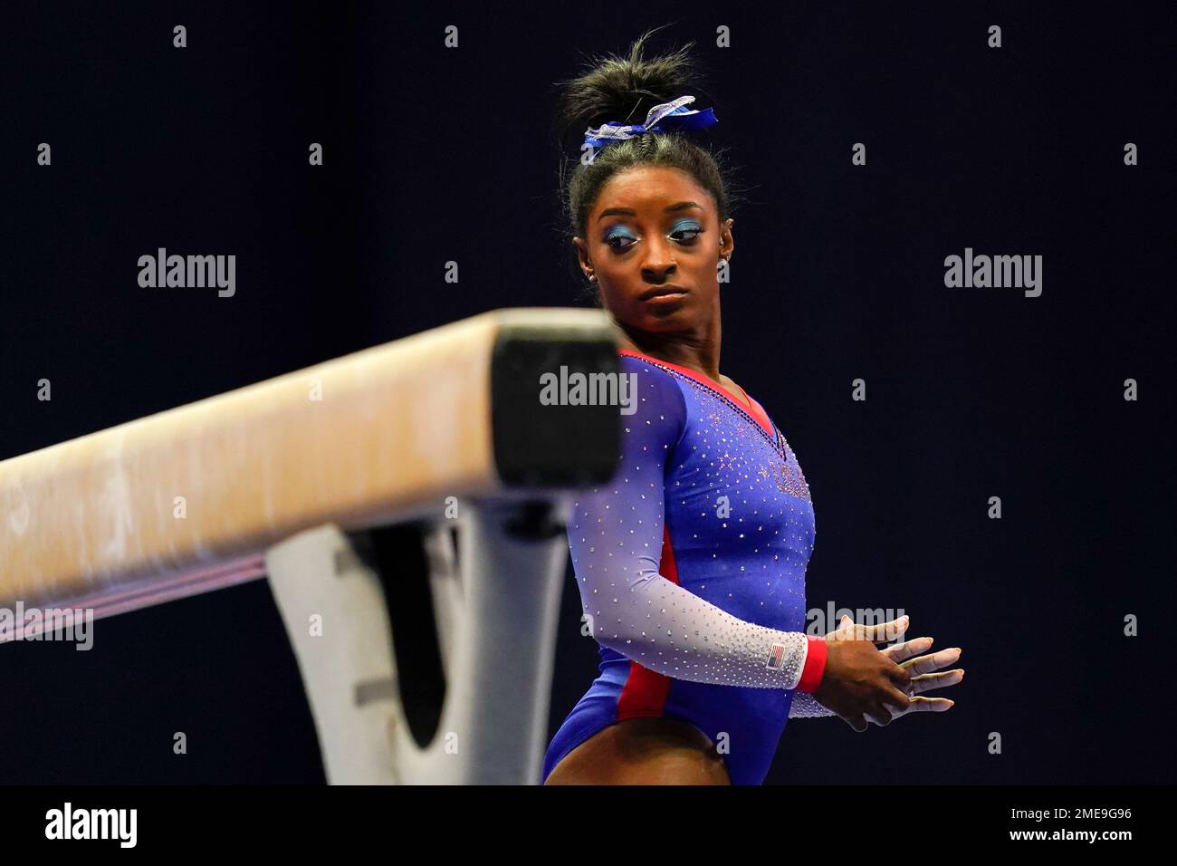 Simone Biles looks back at the balance beam during the women's U.S ...