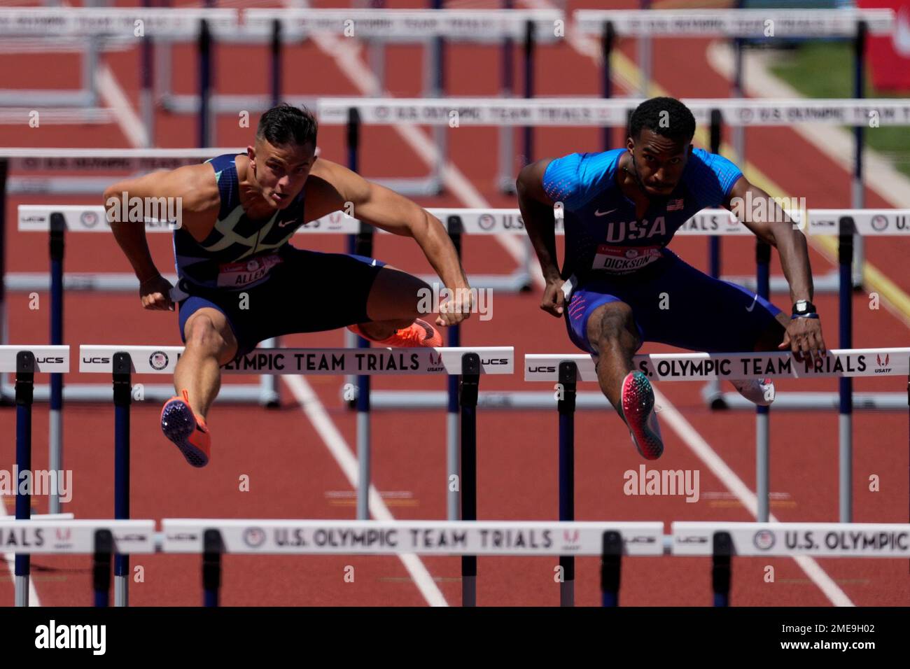 Devon Allen, left, wins the the third heat in the men's 110-meter ...