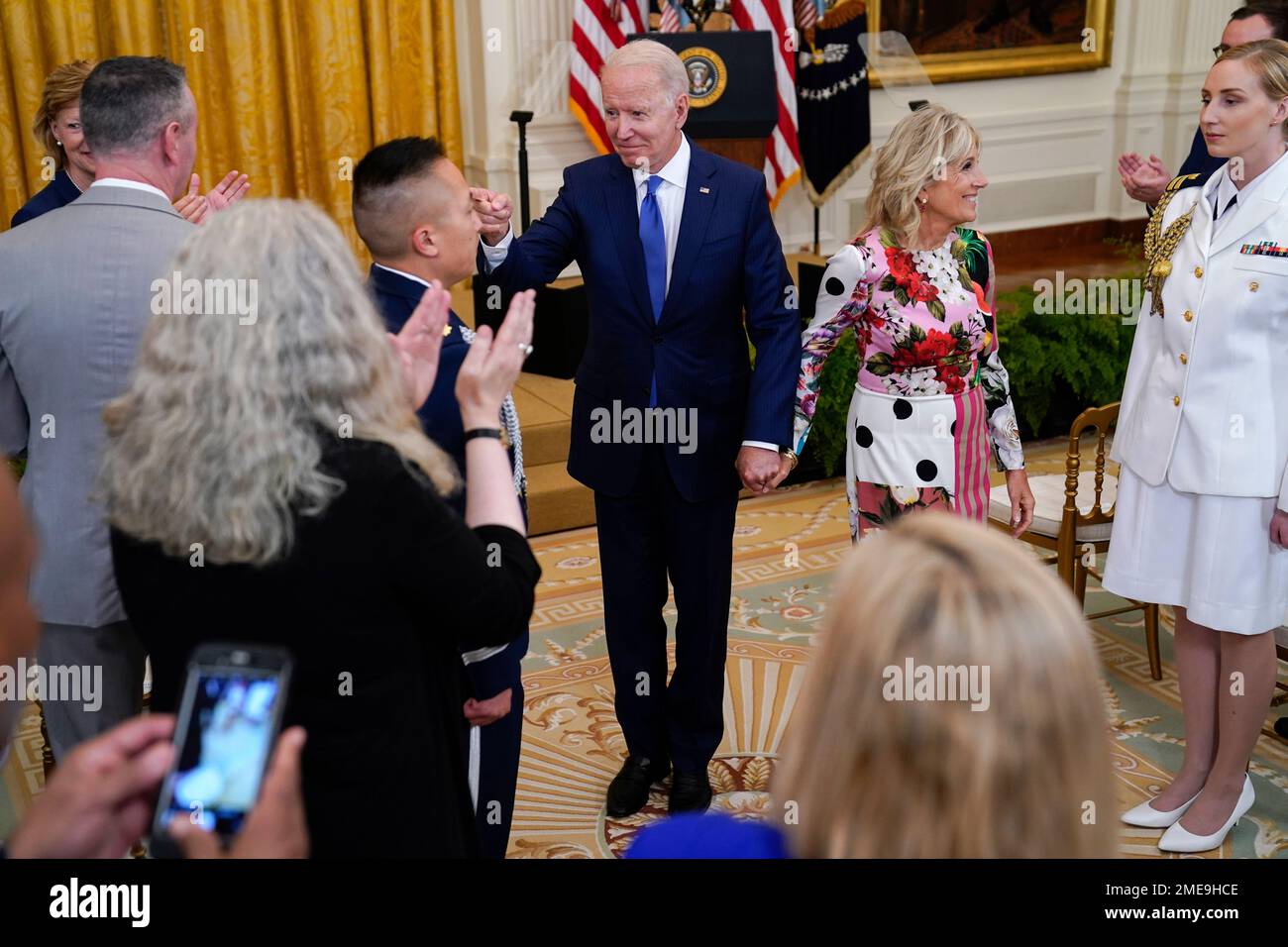 President Joe Biden points to Air Force Lt. Col. Bree Fram after ...
