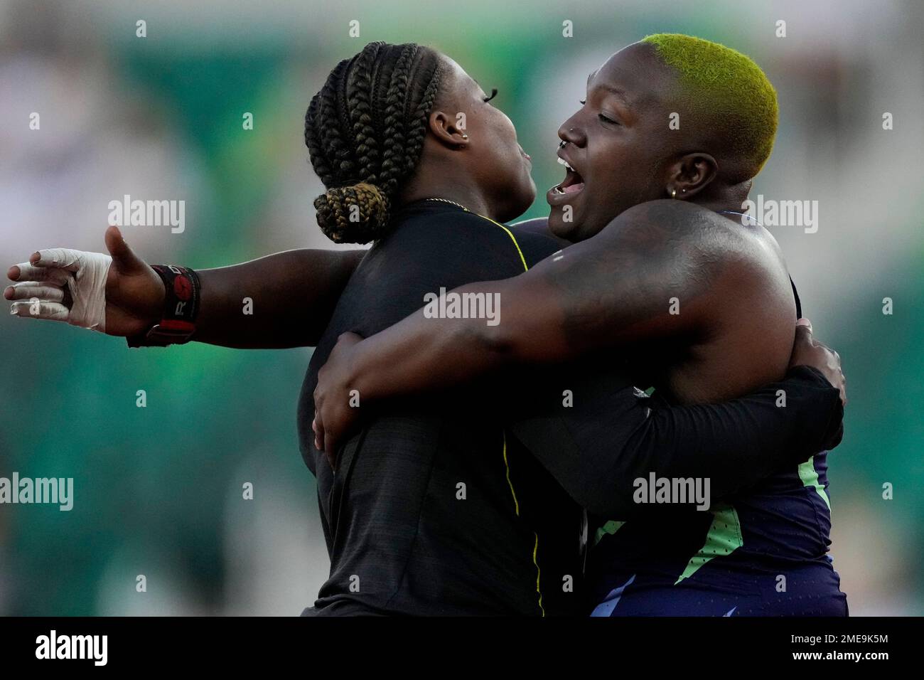 Jessica Ramsey, left, celebrates her first place finish with second ...
