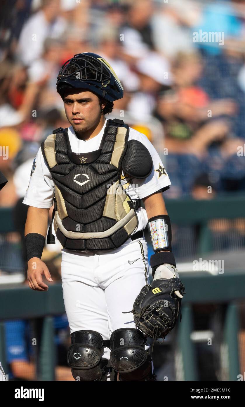 Vanderbilt catcher CJ Rodriguez returns to the dugout following warmups ...