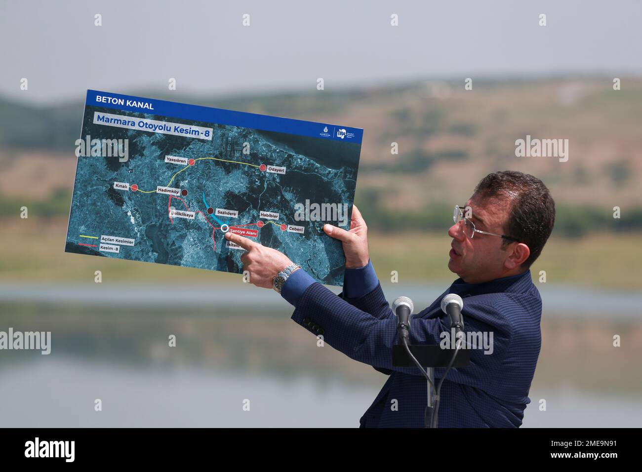 Ekrem Imamoglu, the mayor of Istanbul, points to a map as he talks ...