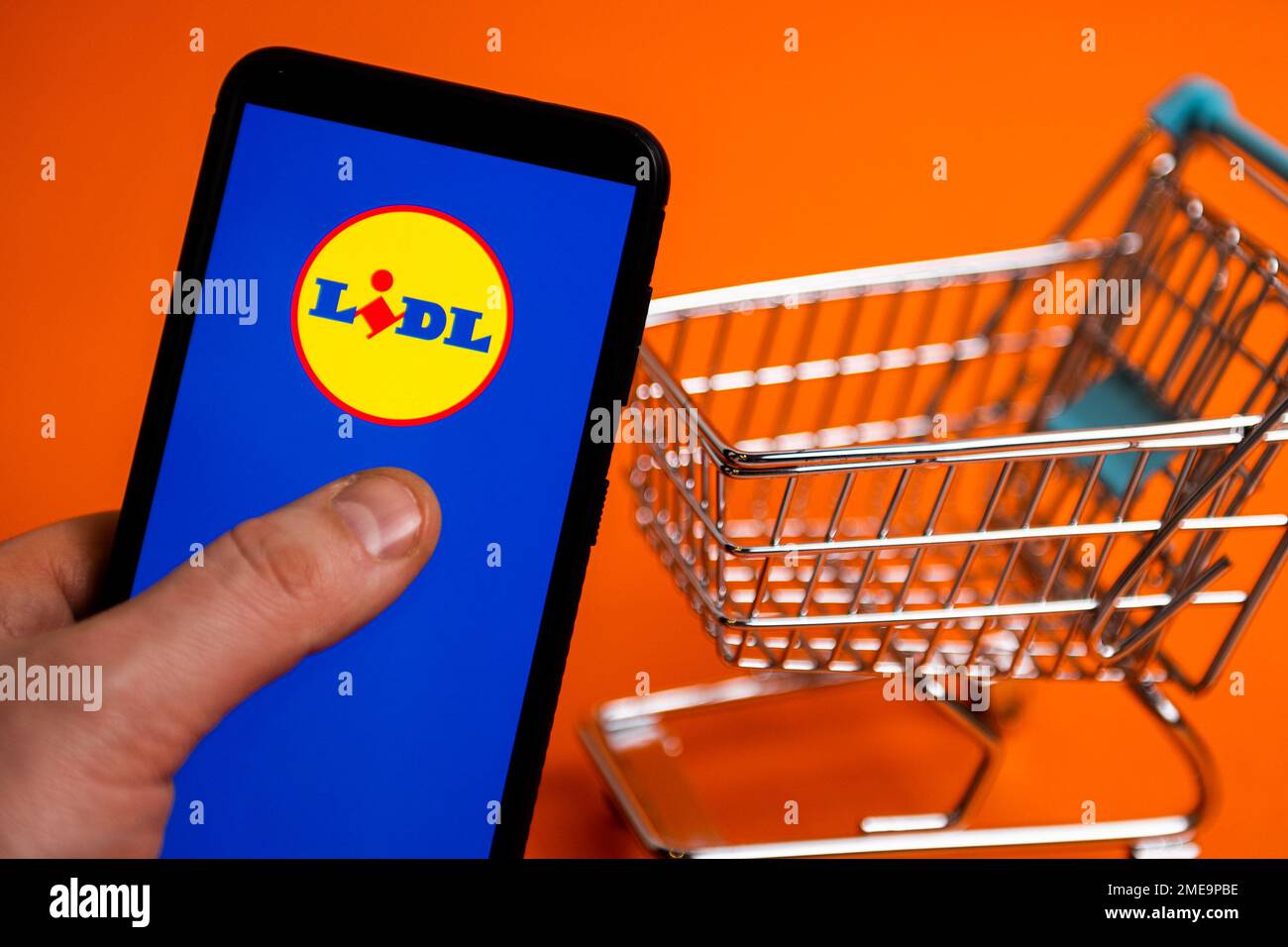 In this photo illustration, a Lidl logo seen displayed on a smartphone ...