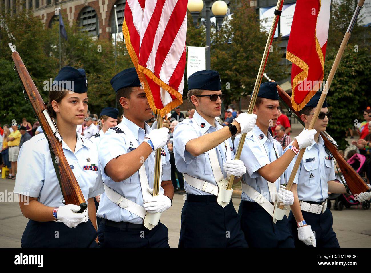 Cadets of the Civil Air Patrol Color Guard march under the command of ...