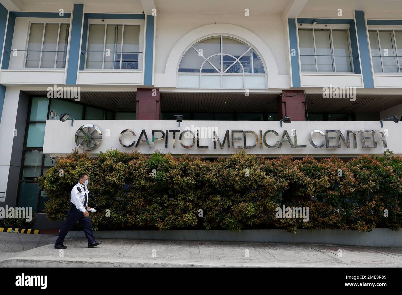 A guard walks outside the Capitol Medical Center where former ...