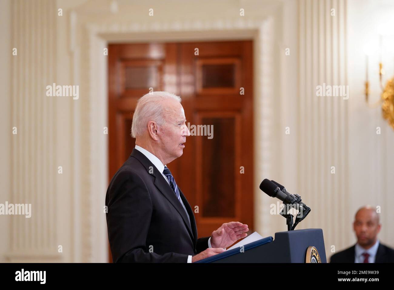 President Joe Biden speaks during an event in the State Dining room of ...