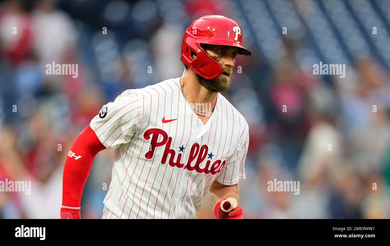 Philadelphia Phillies' Bryce Harper runs the bases after hitting a home ...