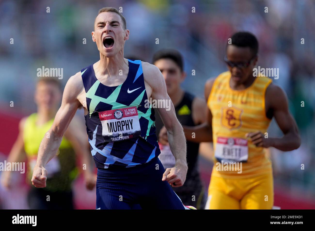 FILE - Clayton Murphy celebrates after winning the men's 800-meter run ...