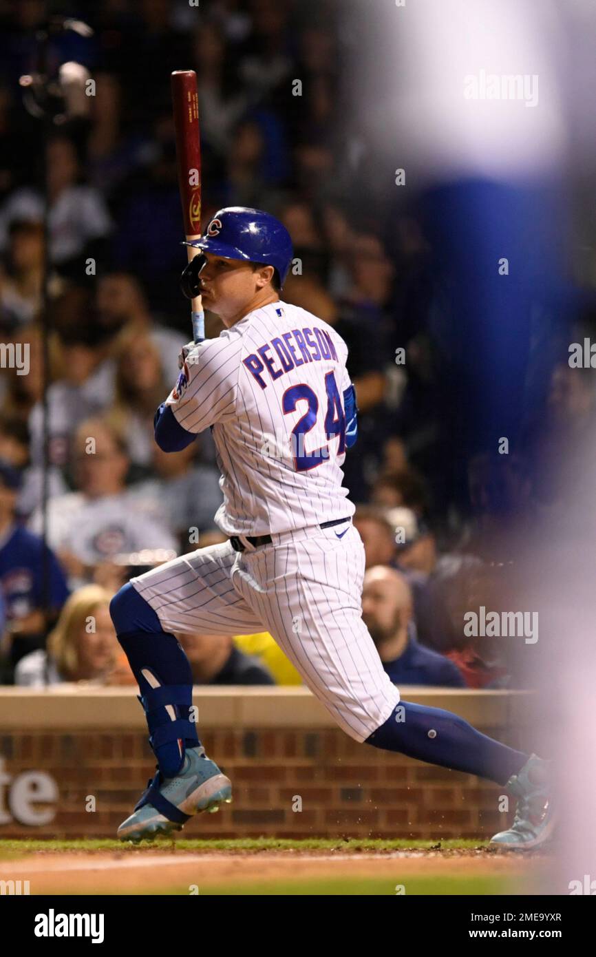 Chicago Cubs' Joc Pederson watches his two-RBI double during the sixth ...