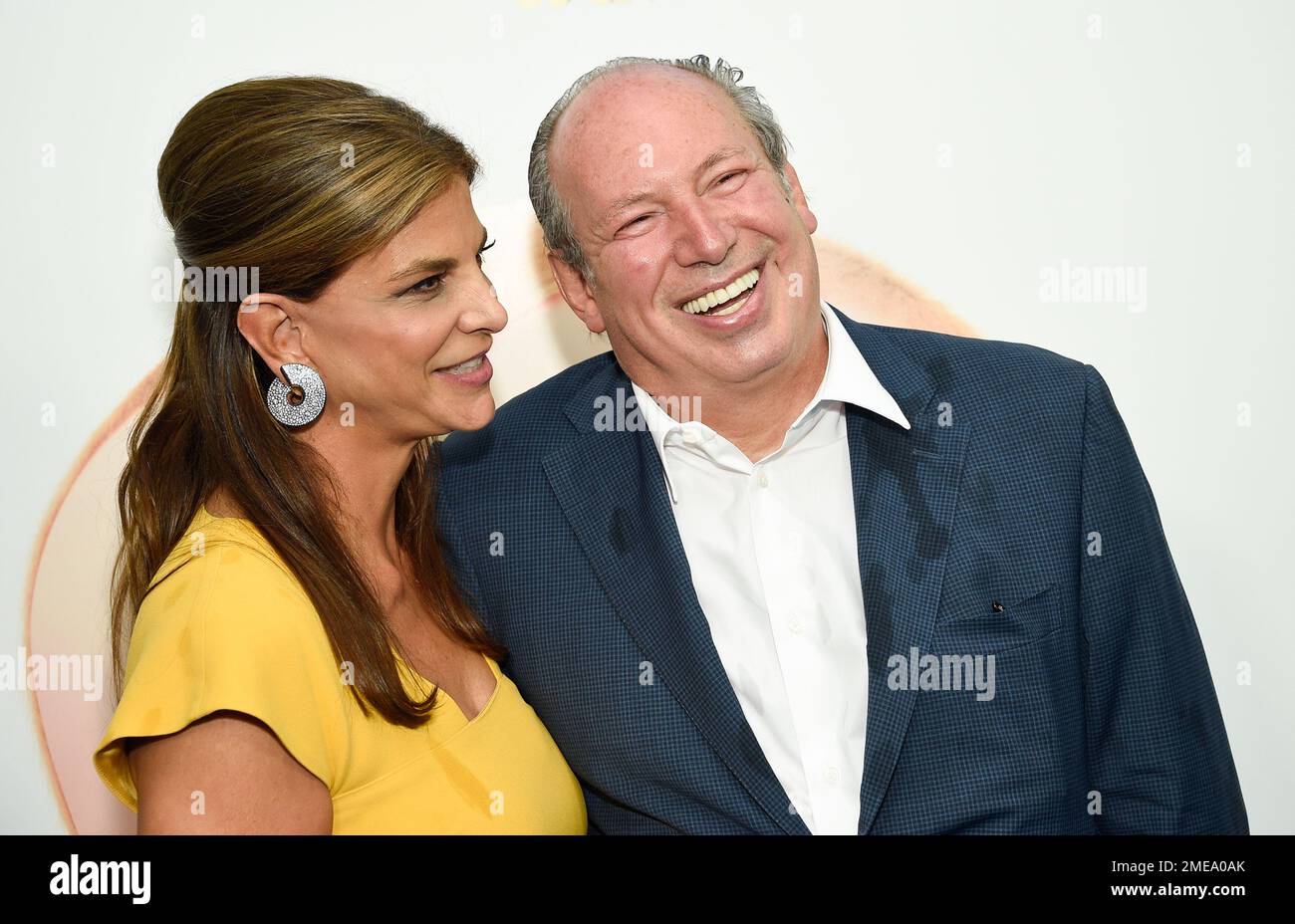Composer Hans Zimmer, right, and girlfriend Dina De Luca attend the ...