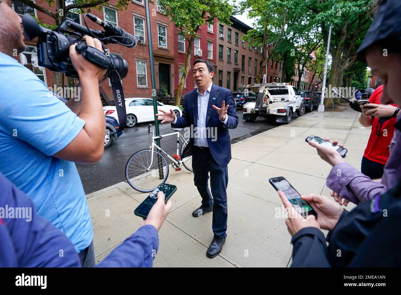 Democratic mayoral candidate Andrew Yang speaks to reporters during a ...