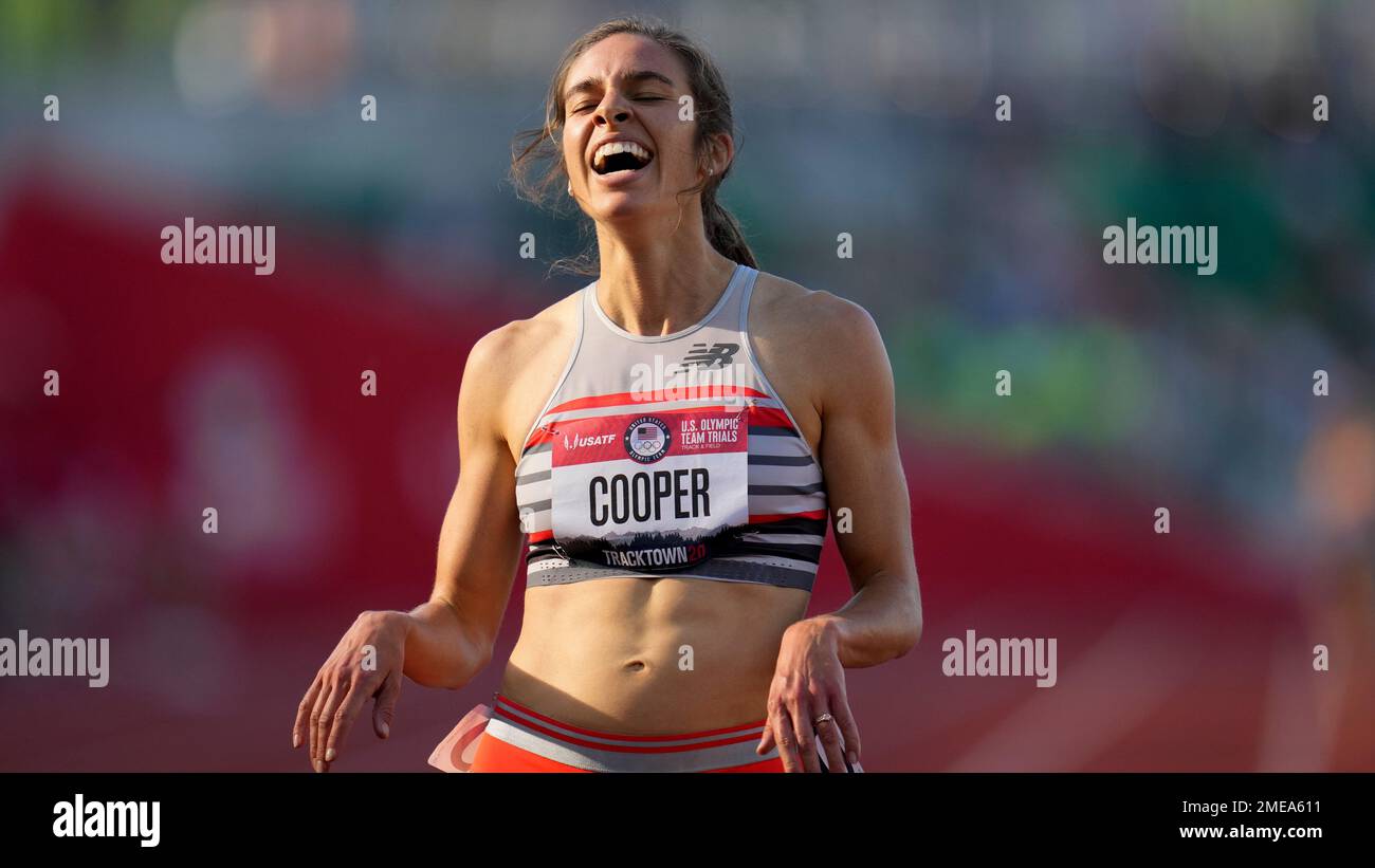 Abbey Cooper wins the first heat of the women's 5000-meter run at the U ...