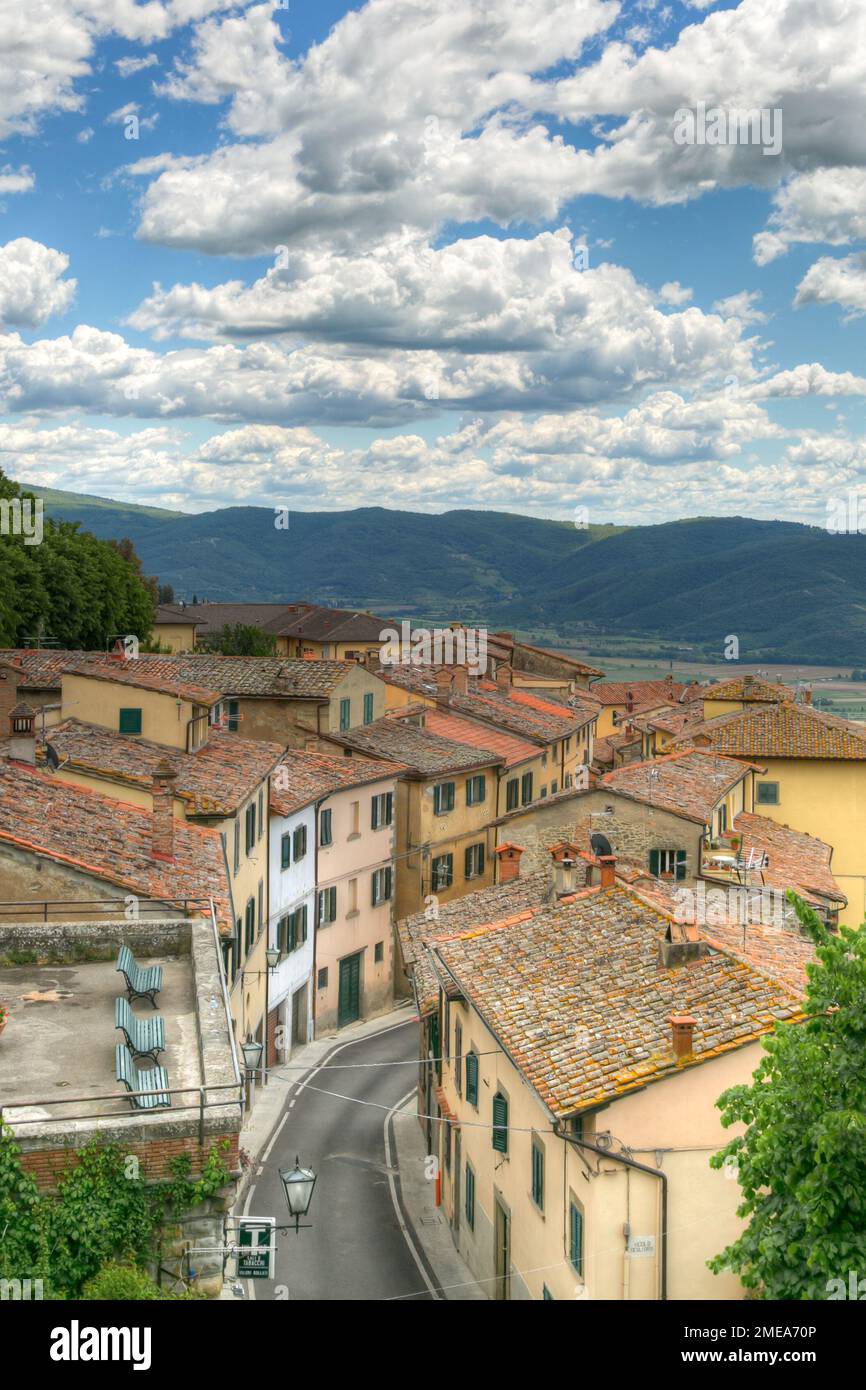 Vertical view of rooftops in the hilltop village of Cortona in ...