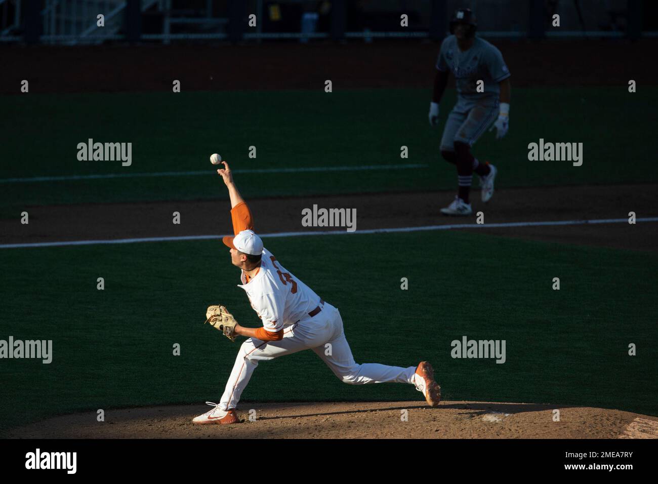 Texas pitcher Ty Madden (32) throws as Mississippi State's Brad Cumbest ...