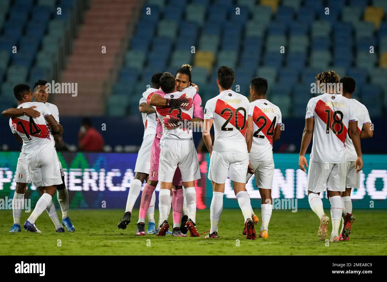 Players of Peru celebrate their team's 2-1 victory over Colombia during ...