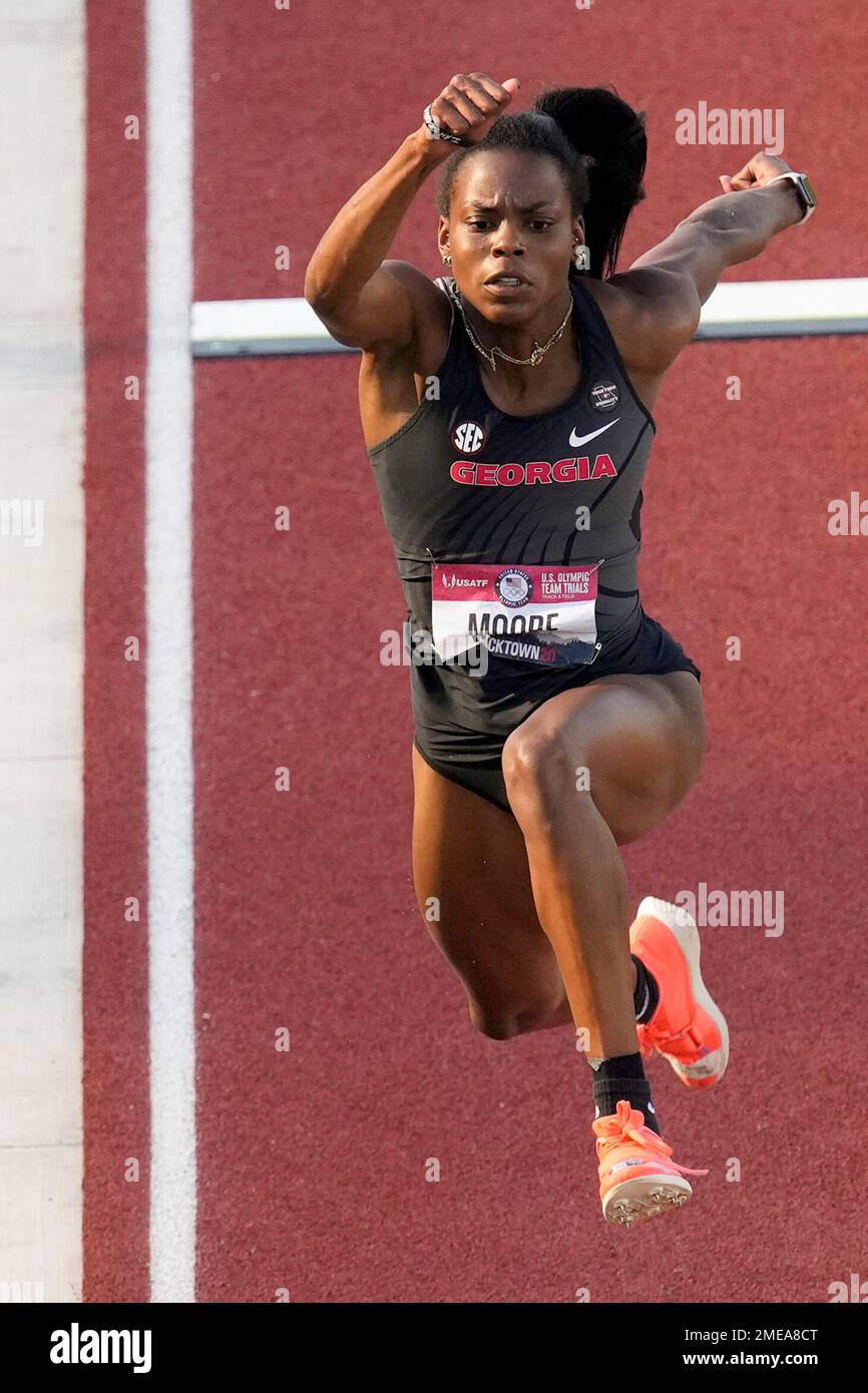 Jasmine Moore competes during the finals of the women's triple jump at ...