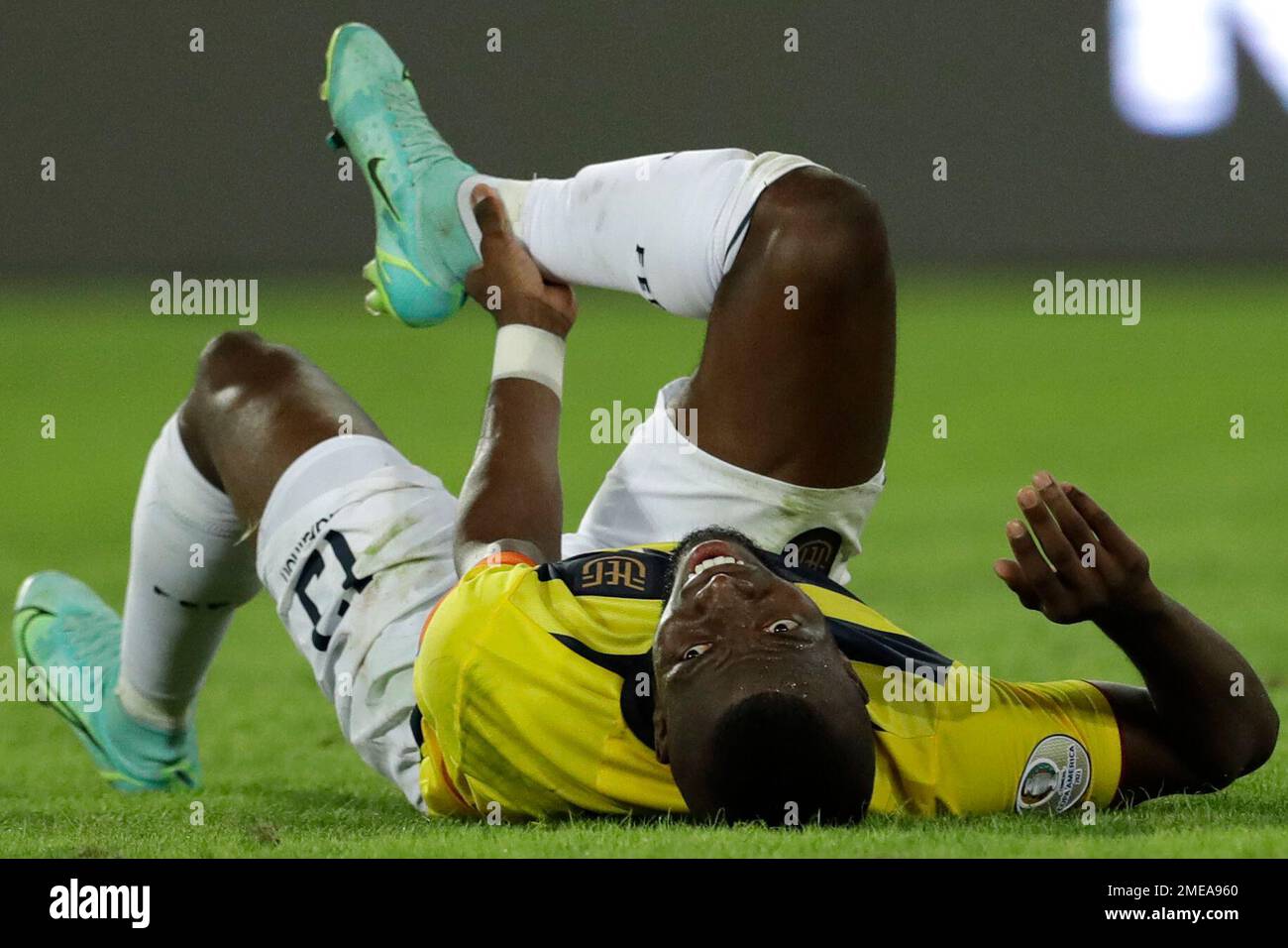 Ecuador's Enner Valencia lies on the pitch in pain during a Copa ...