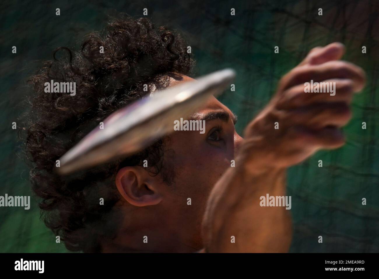 Markus Ballengee competes in the decathlon discus throw at the U.S ...