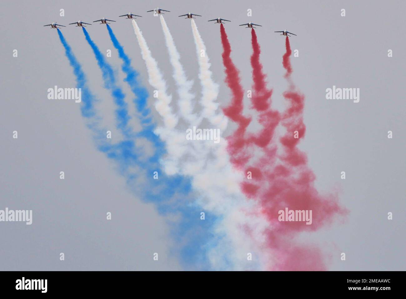 French Air Force Patrouille de France Team fly over the track before ...
