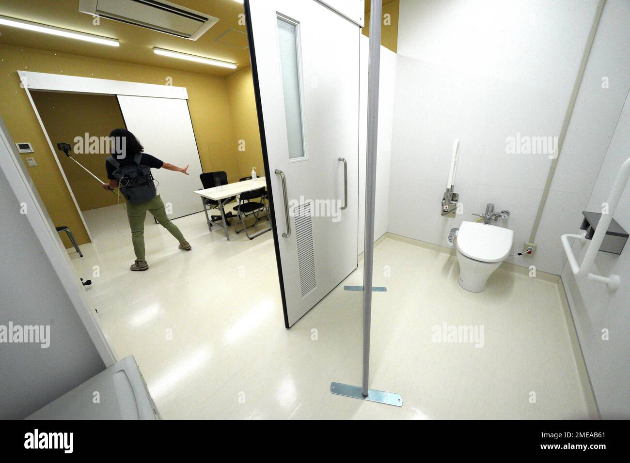 A journalist films a processing room of the Doping Control Station at ...