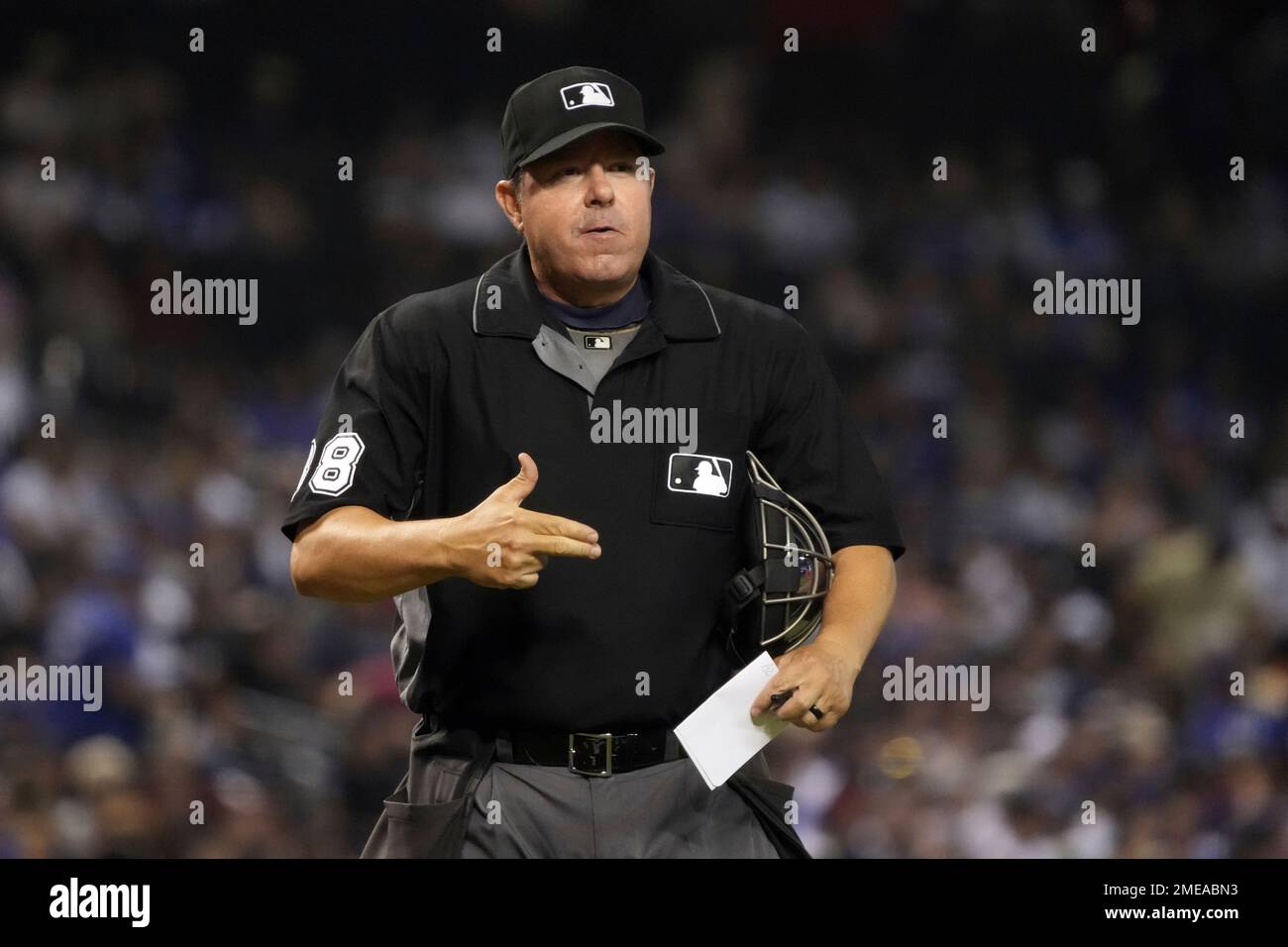 MLB umpire Doug Eddings (88) in the first inning during a baseball game ...