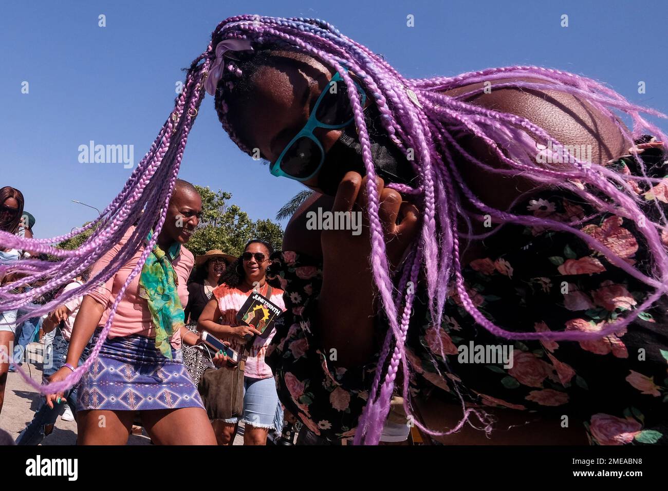 People dance as they celebrate during a Juneteenth commemoration at ...