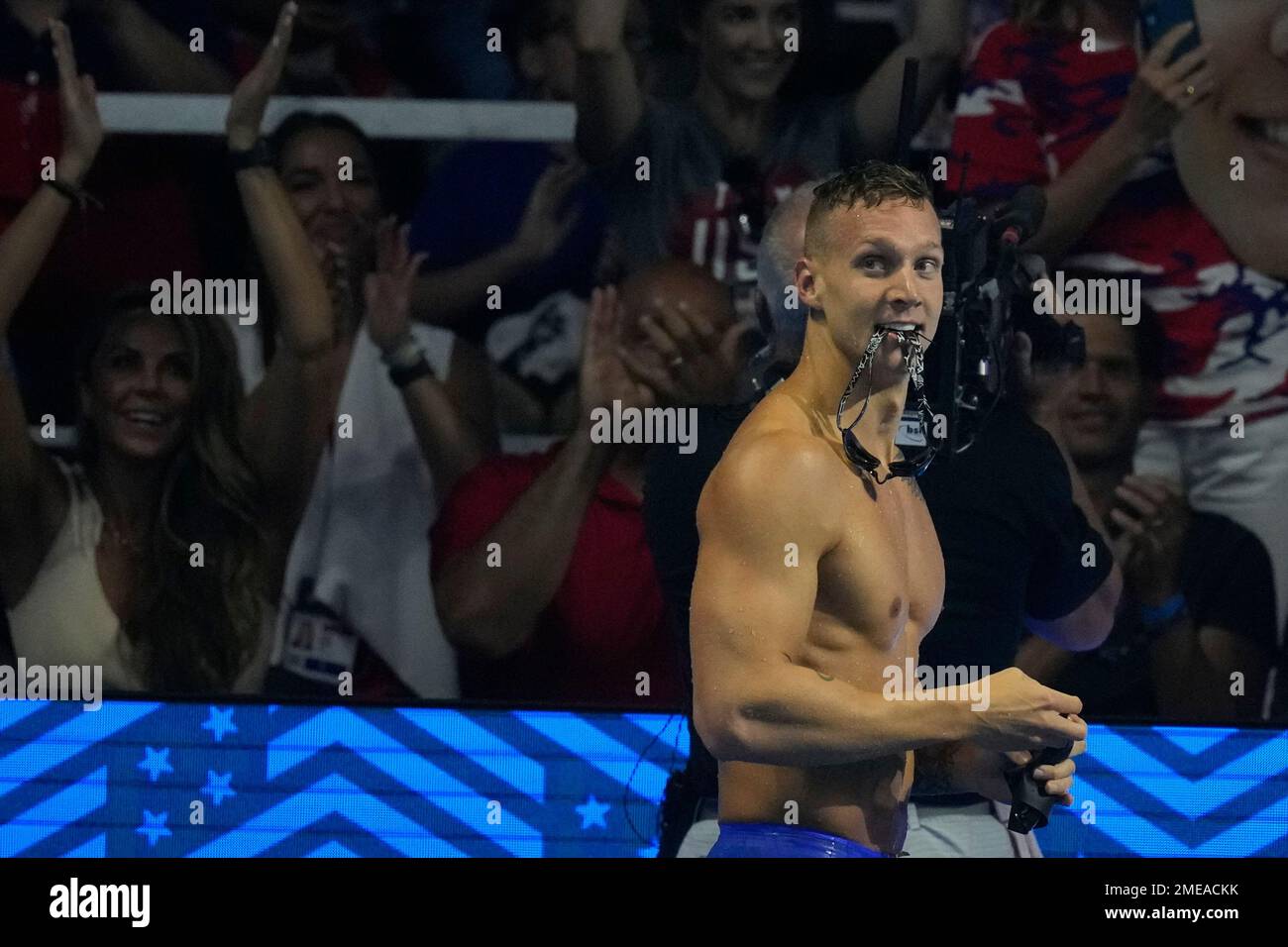 Caeleb Dressel reacts after winning the men's 100 butterfly during wave ...