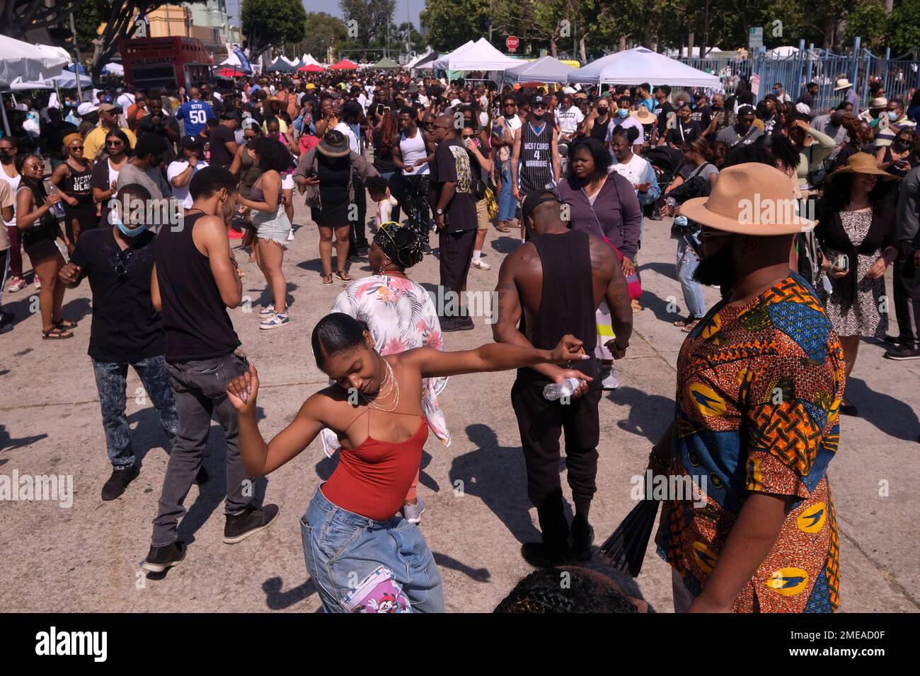 People dance as they celebrate during a Juneteenth commemoration at ...