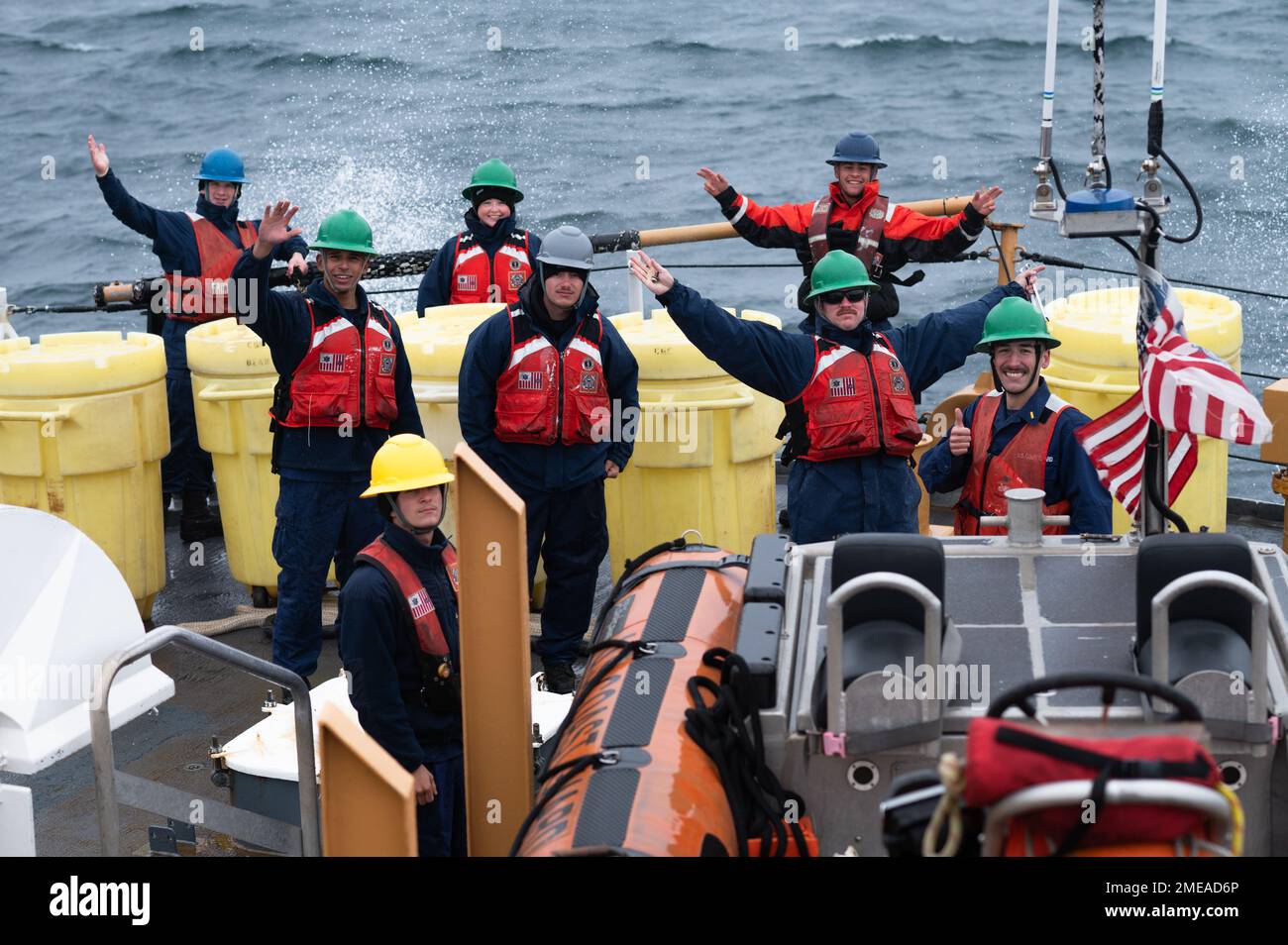 U.S. Coast Guard crew members aboard USCGC Bear (WMEC 901) pose for a ...