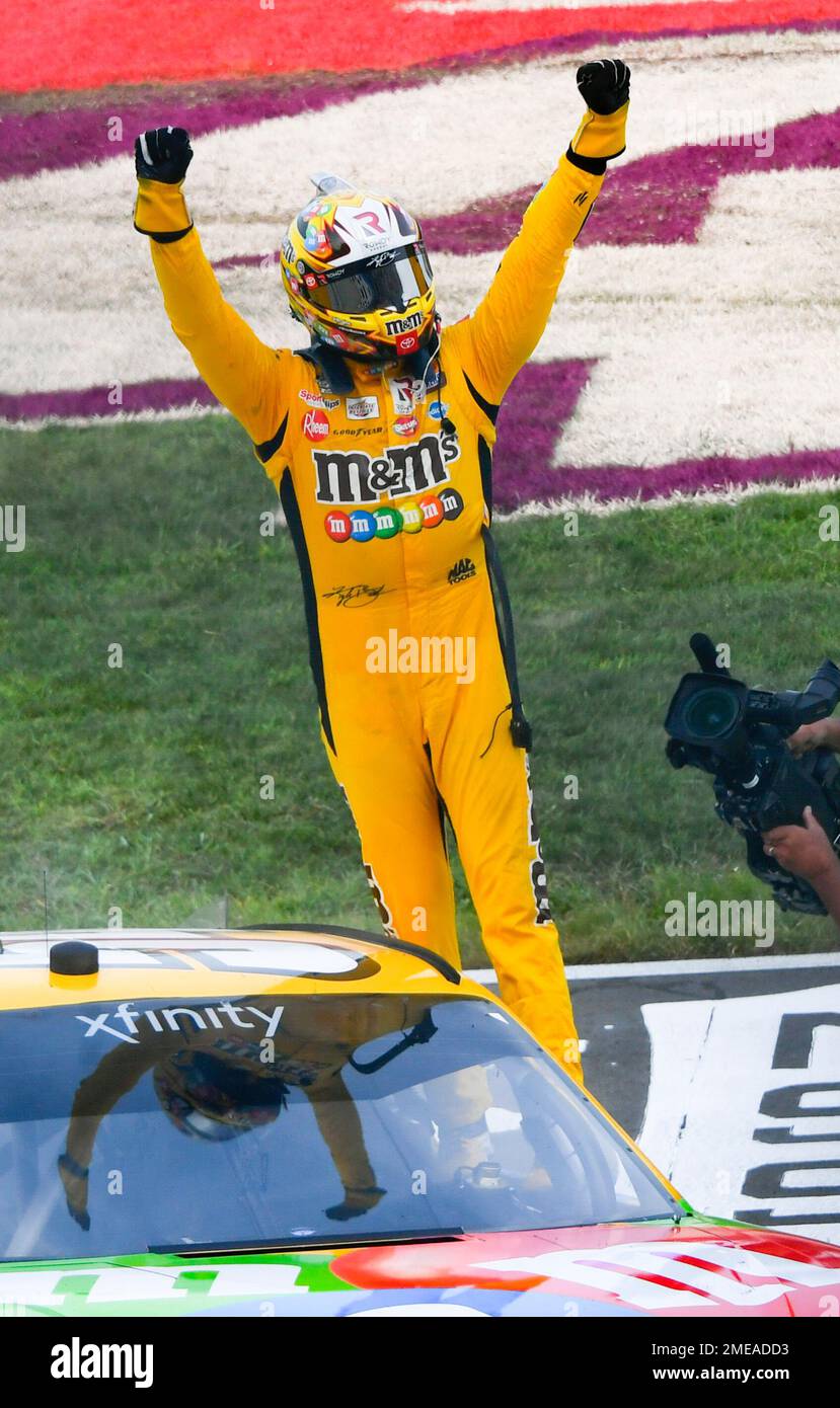 Kyle Busch celebrates at the finish line after winning a NASCAR Xfinity ...