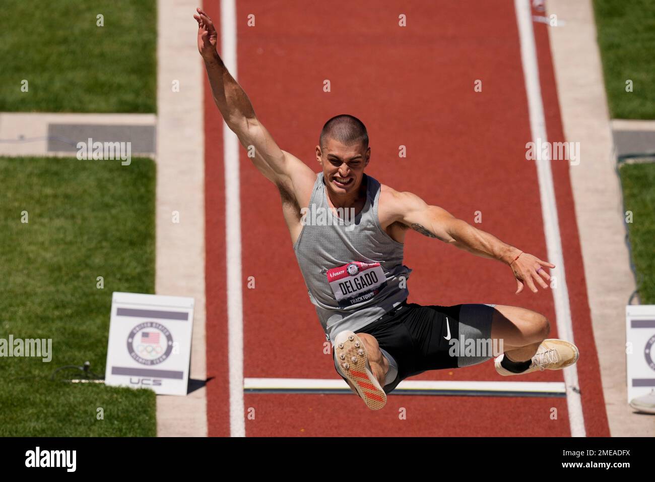 Joseph Delgado competes during the decathlon long jump at the U.S ...