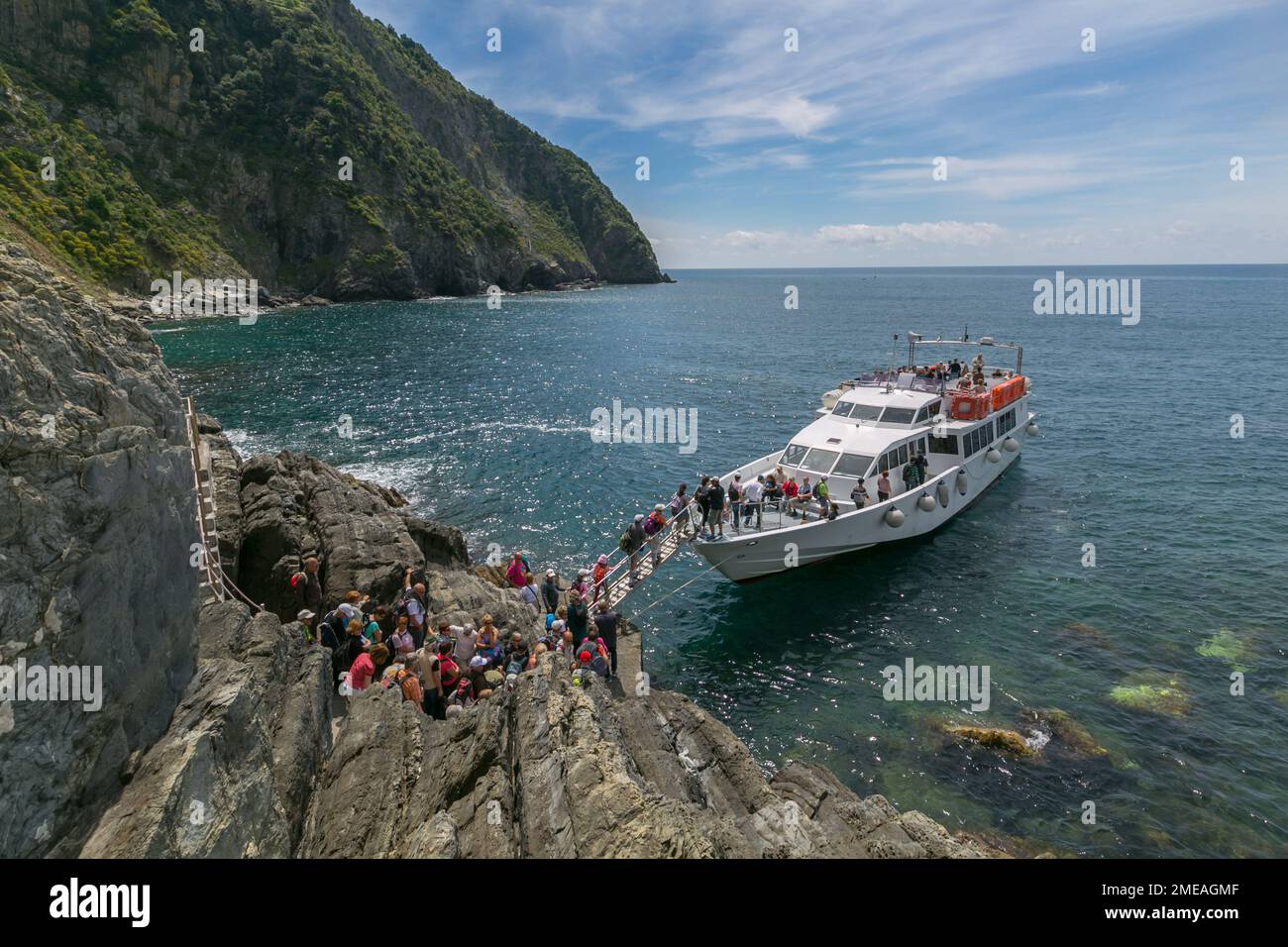Passengers boarding the ferry in Riomaggiore, Cinque Terre, Italy Stock ...
