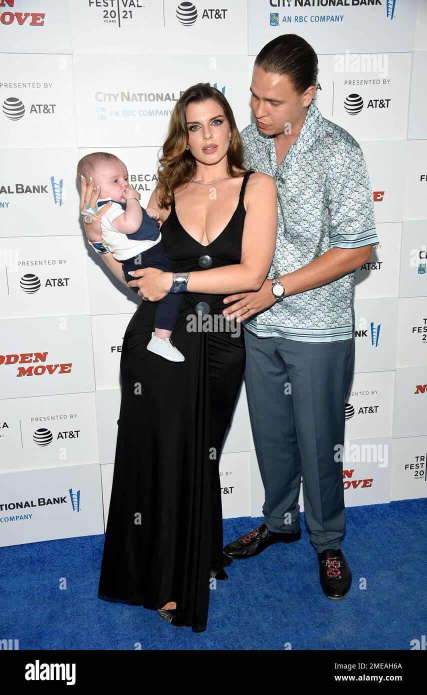 Actress Julia Fox poses with husband Peter Artemiev and their son ...