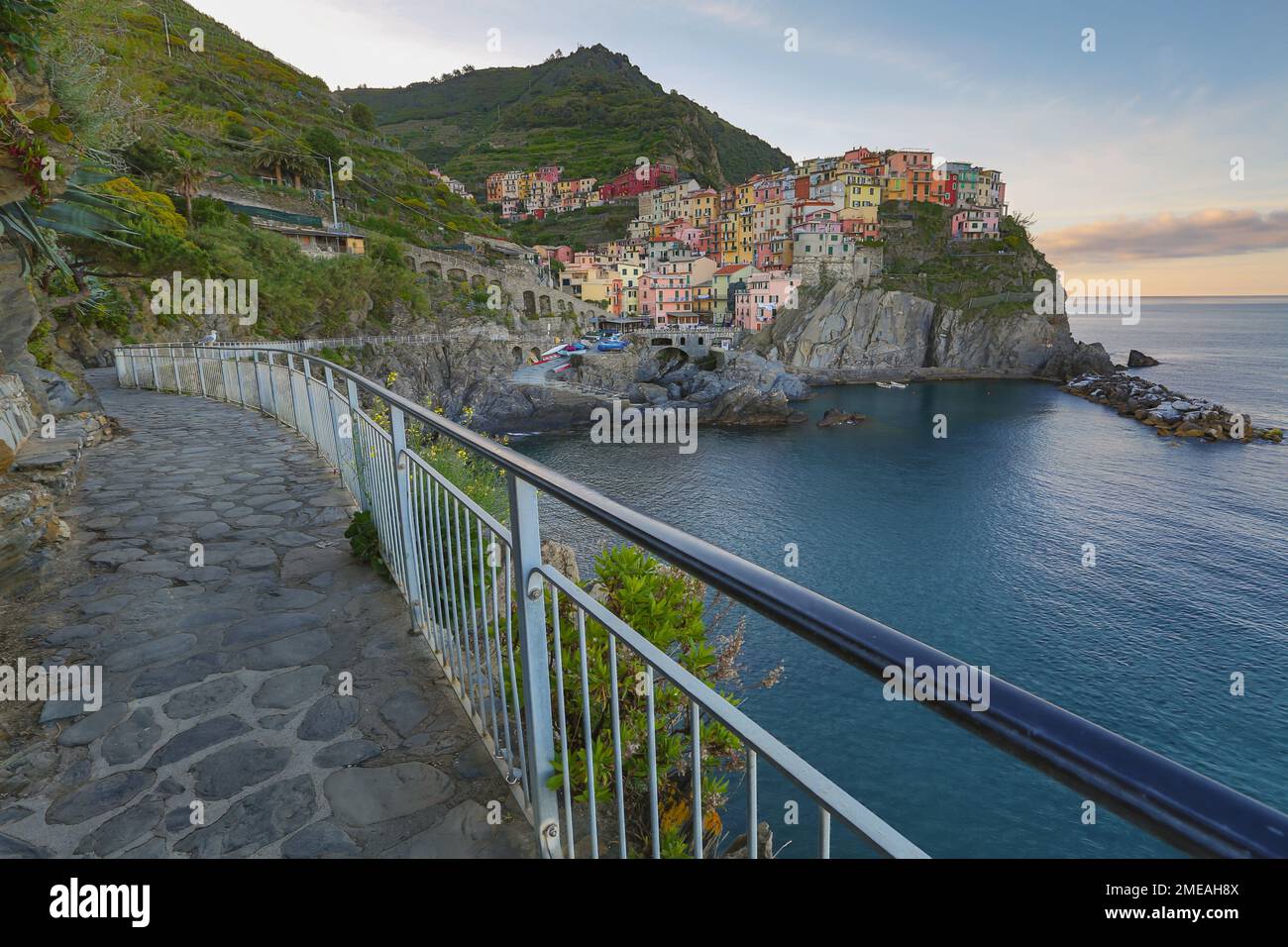 Early morning view of cliffside coastal village of Manarola, Cinque ...