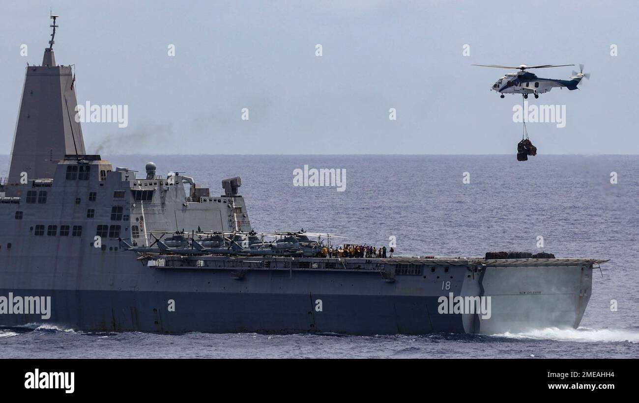 An EC-255 Super Puma with the Maritime Pre-Positioning Force lifts ...