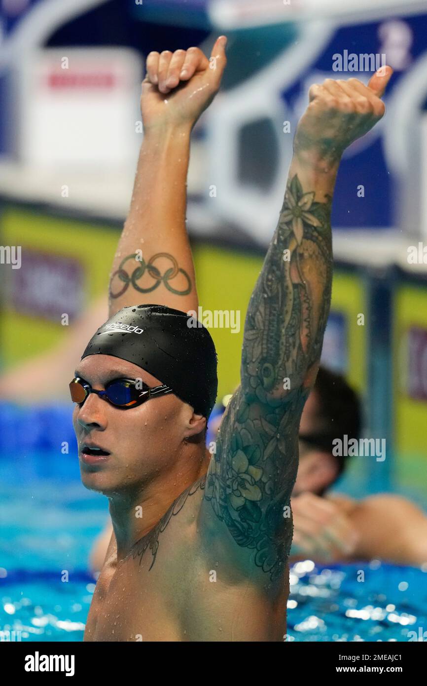 Caeleb Dressel reacts after winning the men's 100-meter freestyle final ...