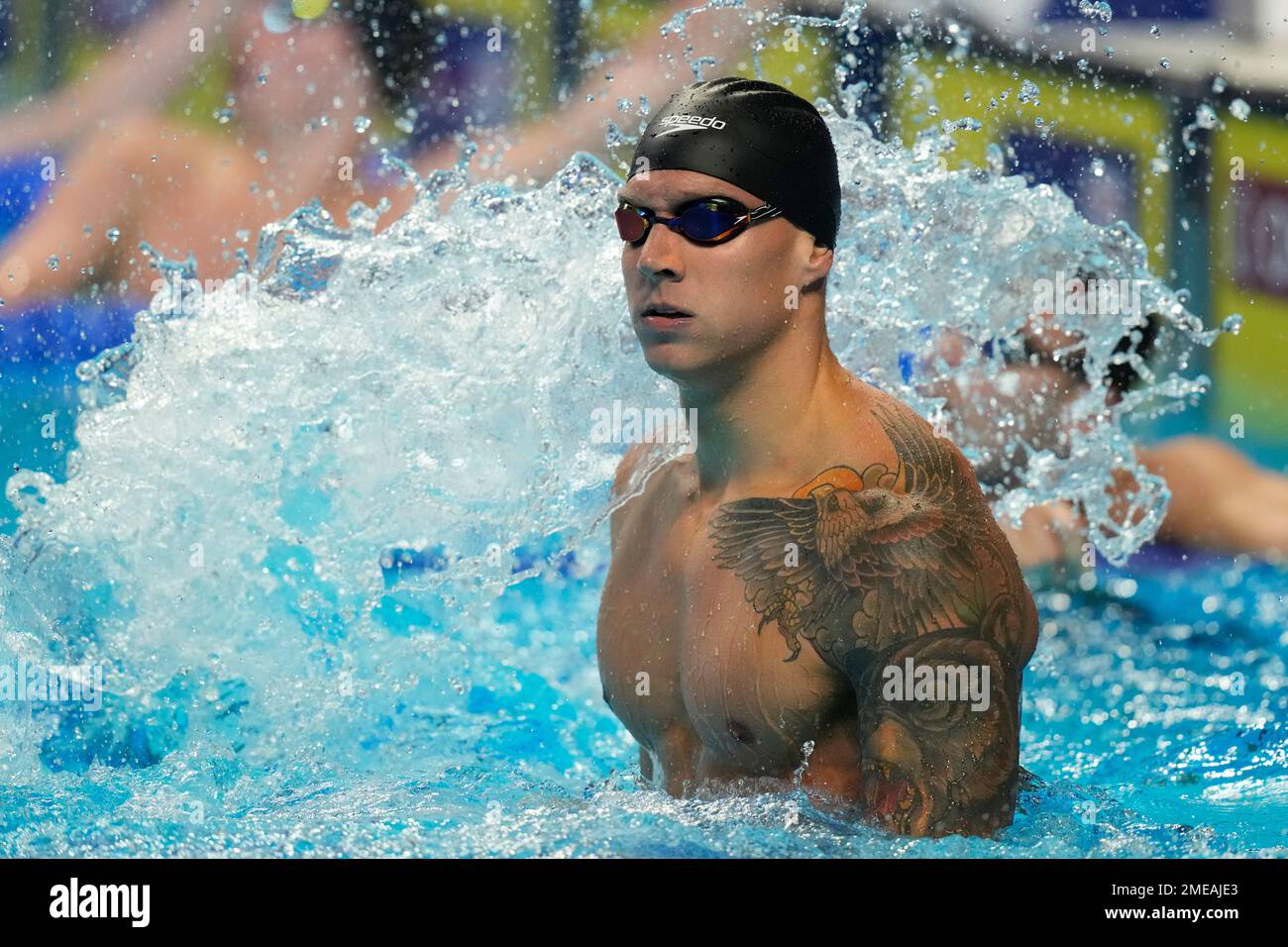 Caeleb Dressel celebrates after winning the men's 100-meter freestyle ...